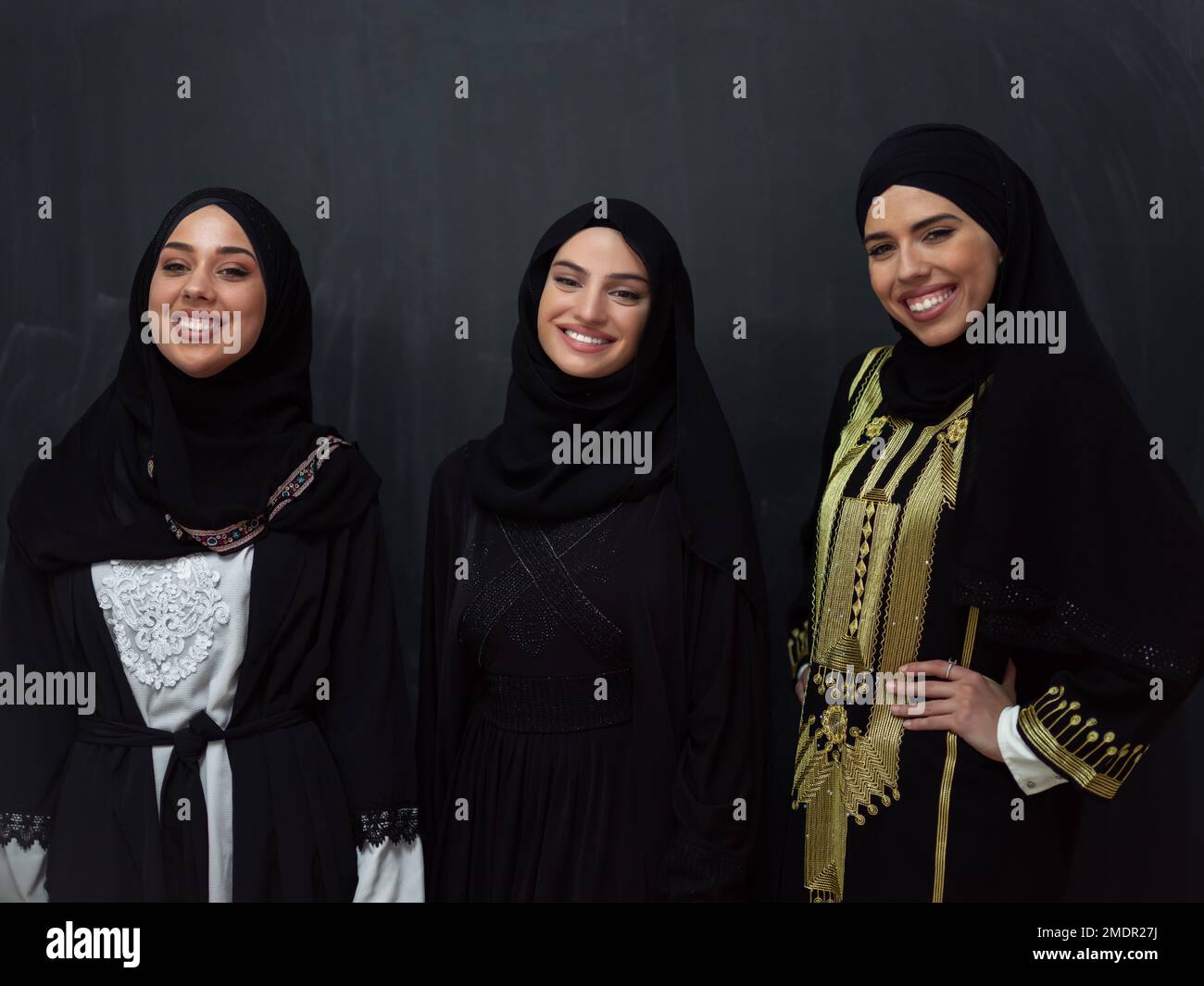 Group portrait of beautiful Muslim women in a fashionable dress with ...