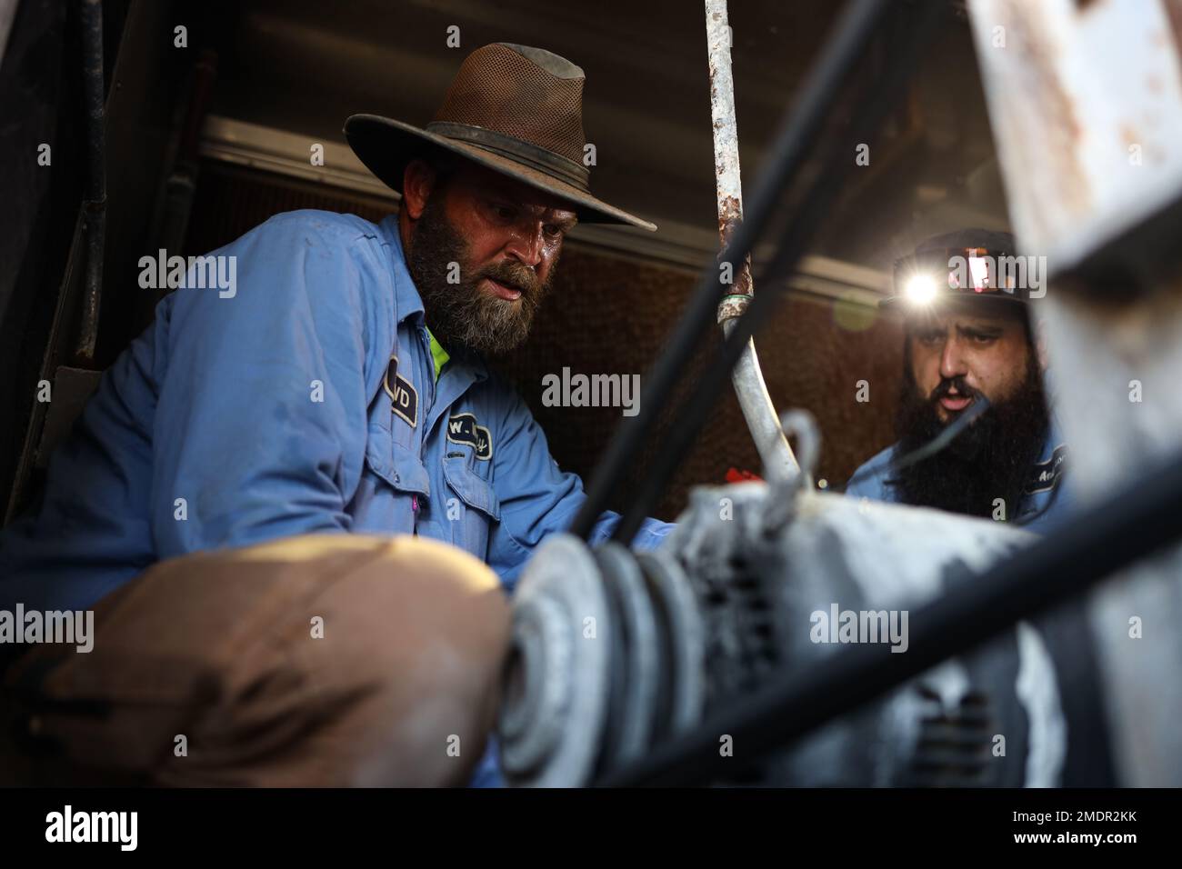 William Moody (left) and Bryan Anderson (right), a heating, ventilation ...