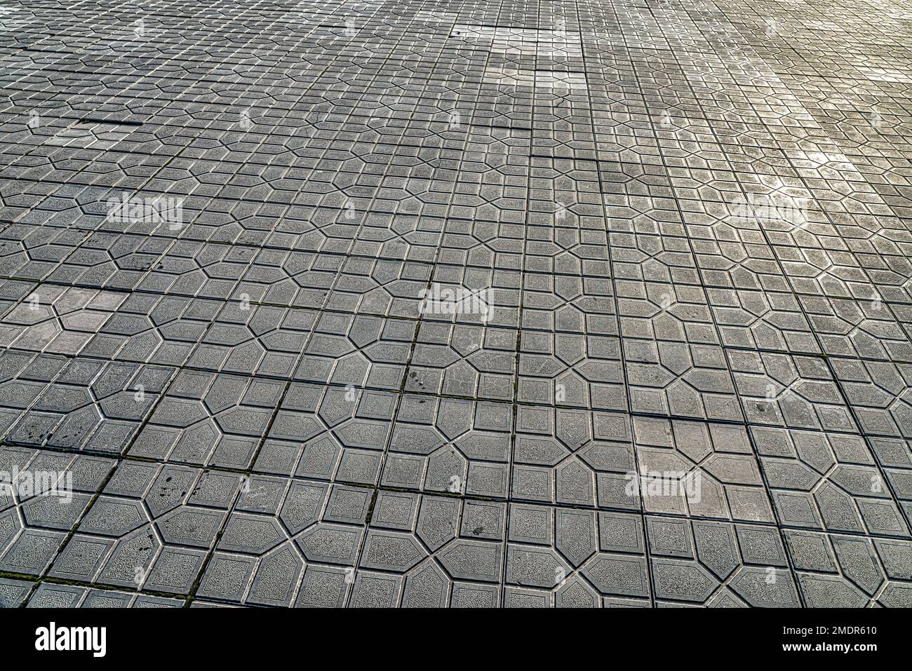 The texture of a monotonous tiled pavement with perspective Stock Photo ...