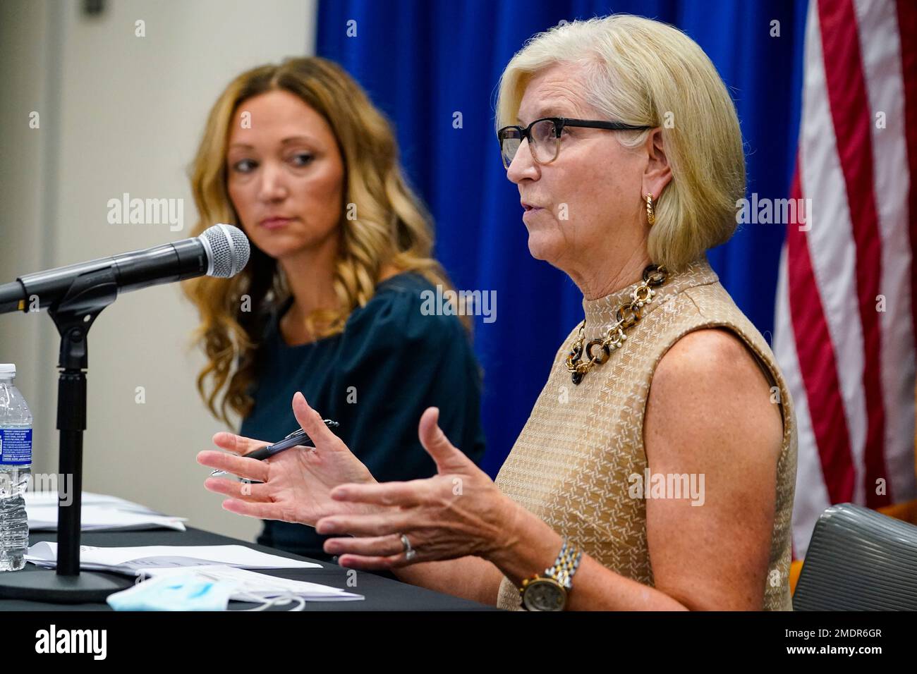 Dr. Kris Box, right, Indiana State Health Commissioner, speaks as Dr ...