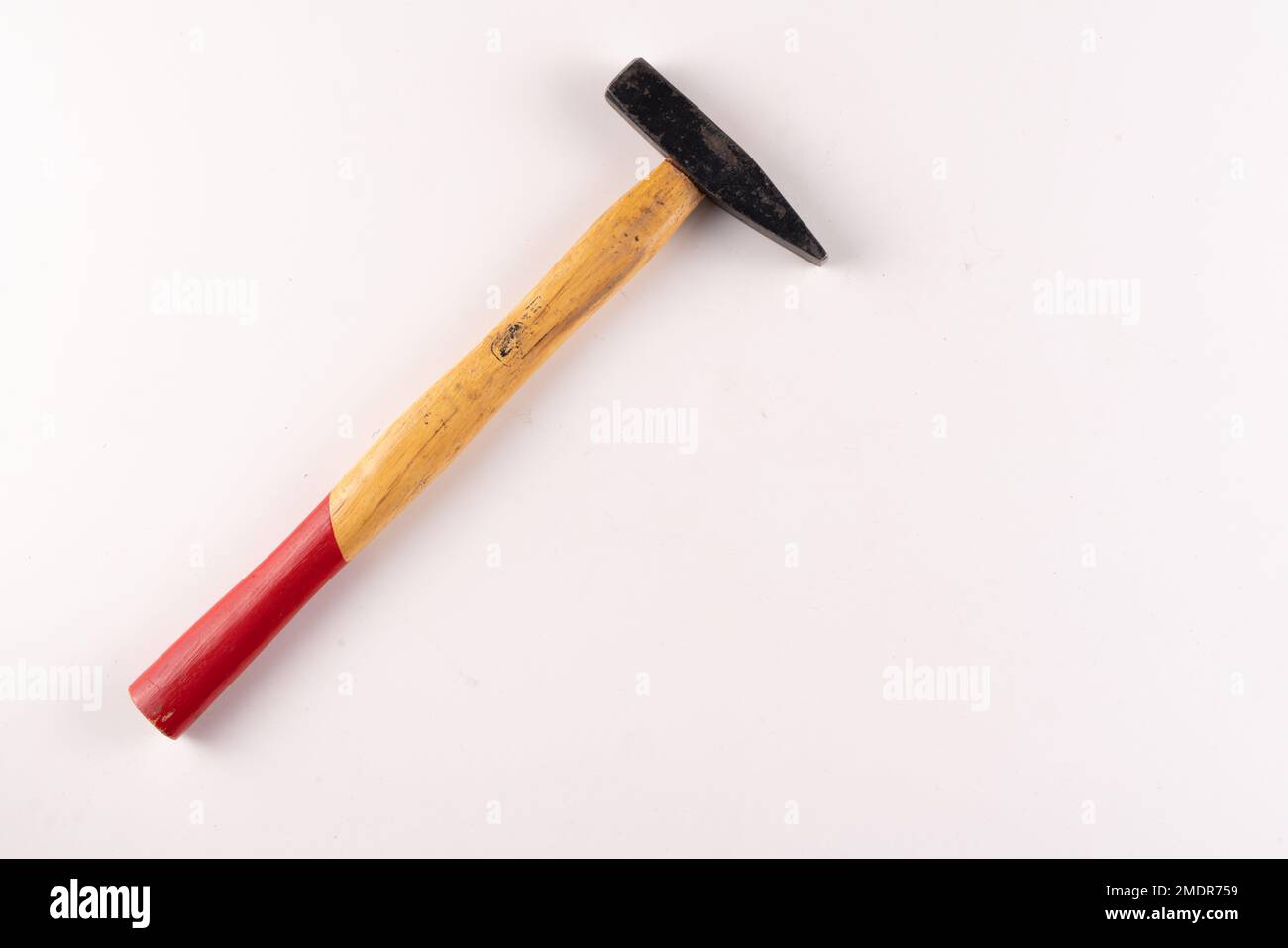 Selective focus top view of standard hammer with text area isolated on ...