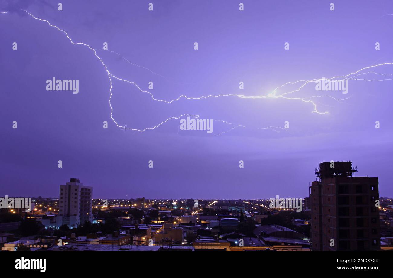 The bright blizzards in the night sky above the city Stock Photo - Alamy