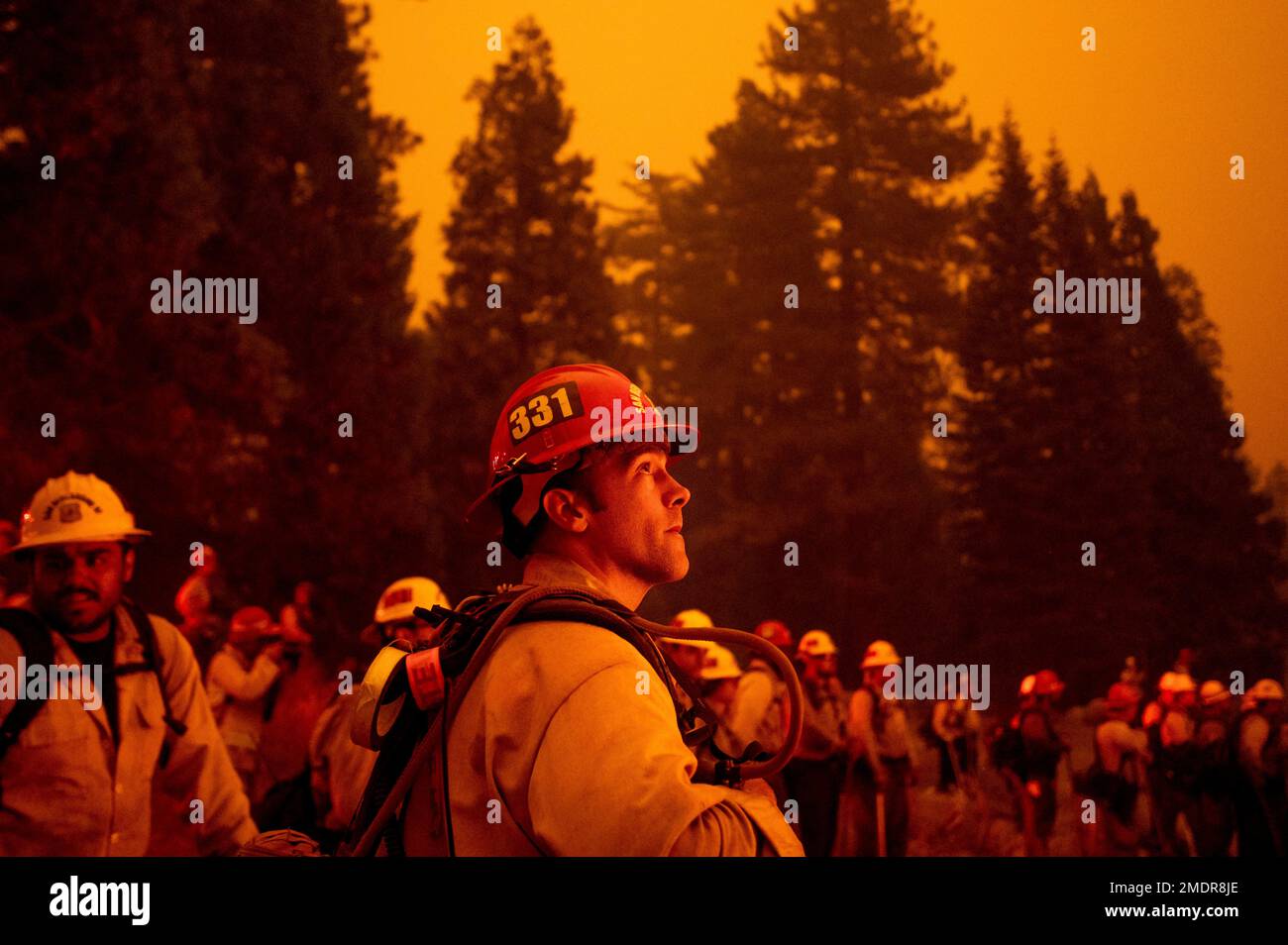 Capt. Adam Tinker monitors a firing operation, where crews burn ...