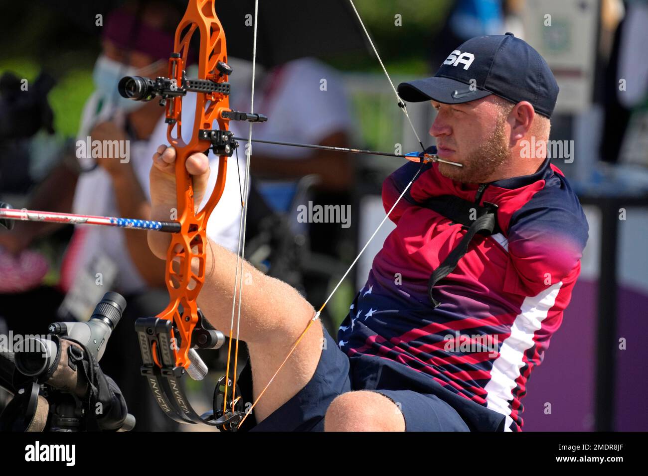 Matt Stutzman of the U.S. holds the bow with his foot as he competes in ...