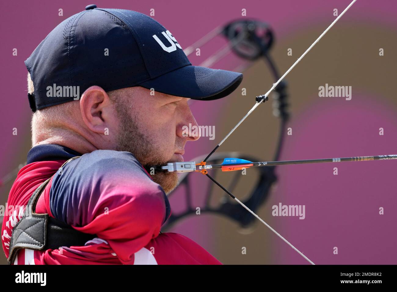 Matt Stutzman of the U.S. holds the arrow with his mouth as he competes ...