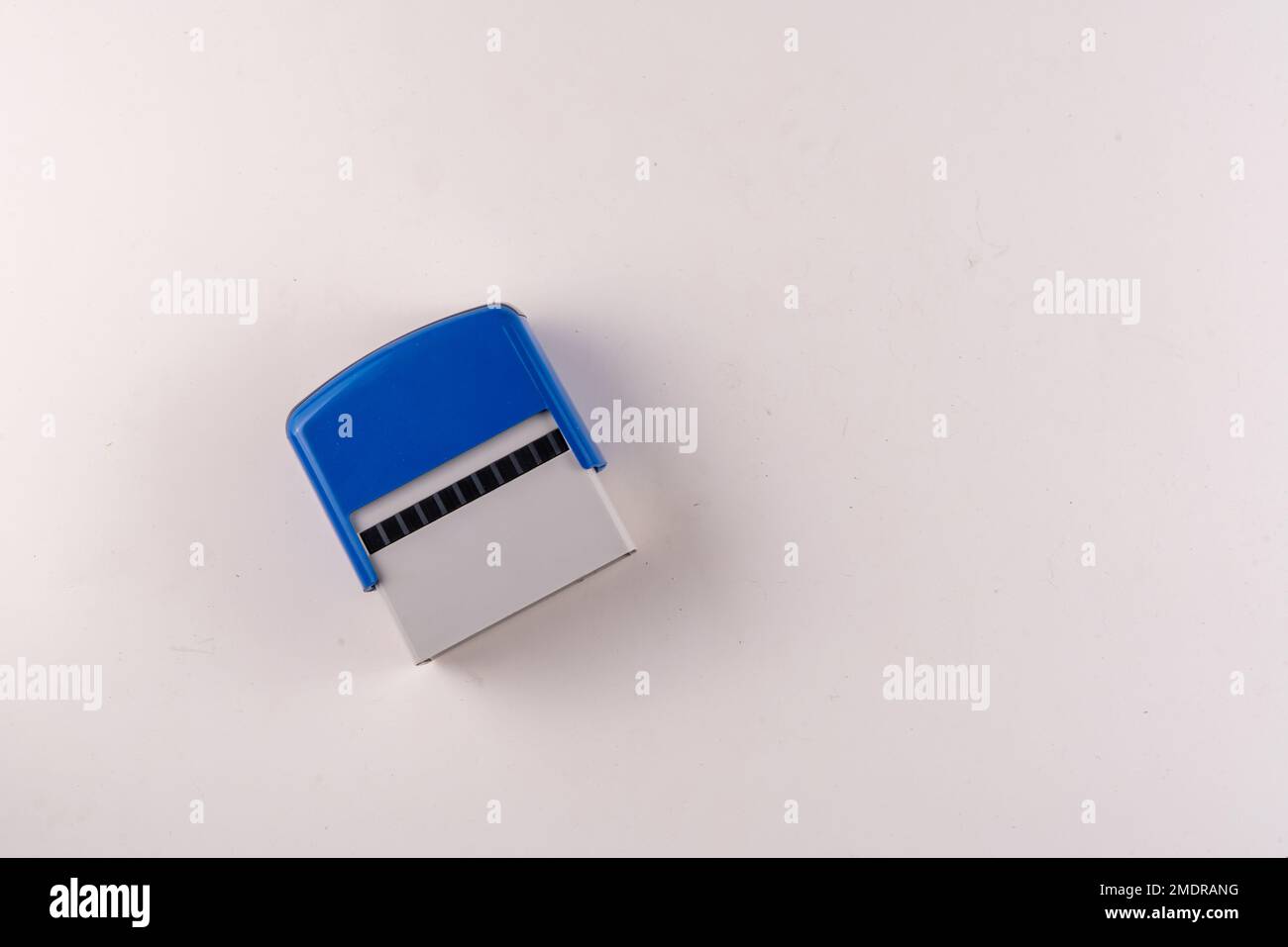 Selective focus top view of rubber stamp isolated on white background ...