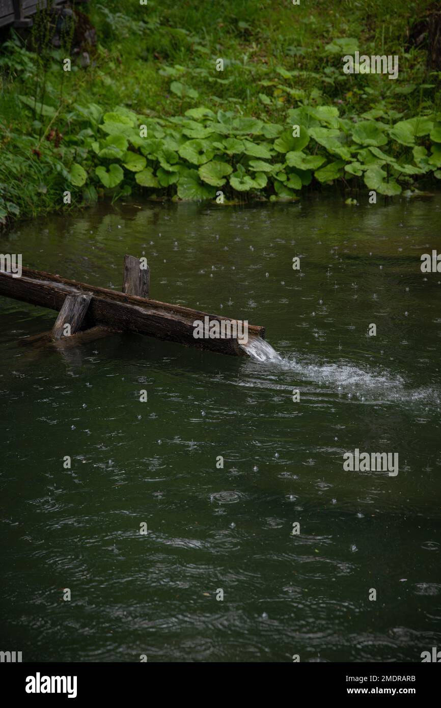 Wooden channel with spring water hi-res stock photography and images ...