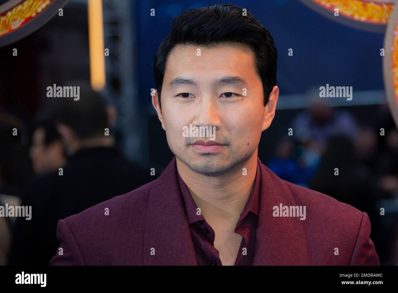 Actor Simu Liu poses for photographs on the red carpet for the premiere ...