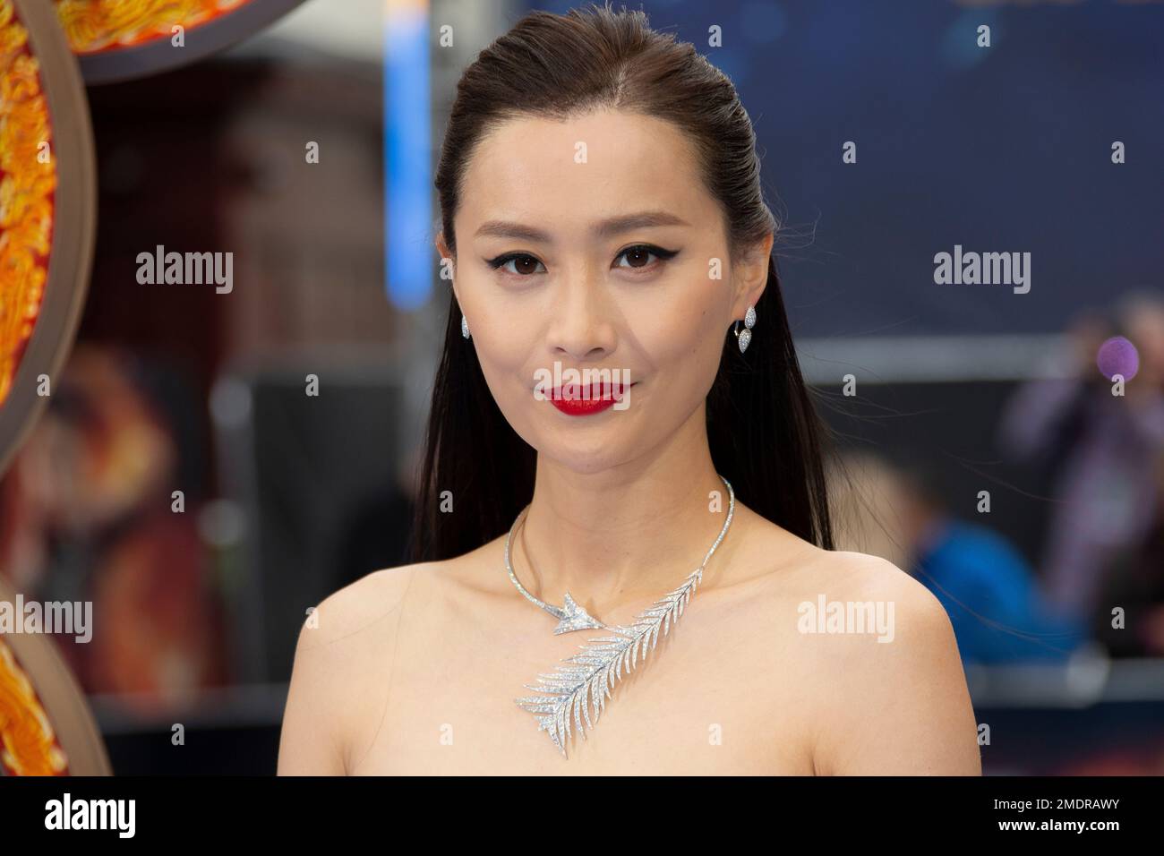 Actor Fala Chen poses for photographs on the red carpet for the ...