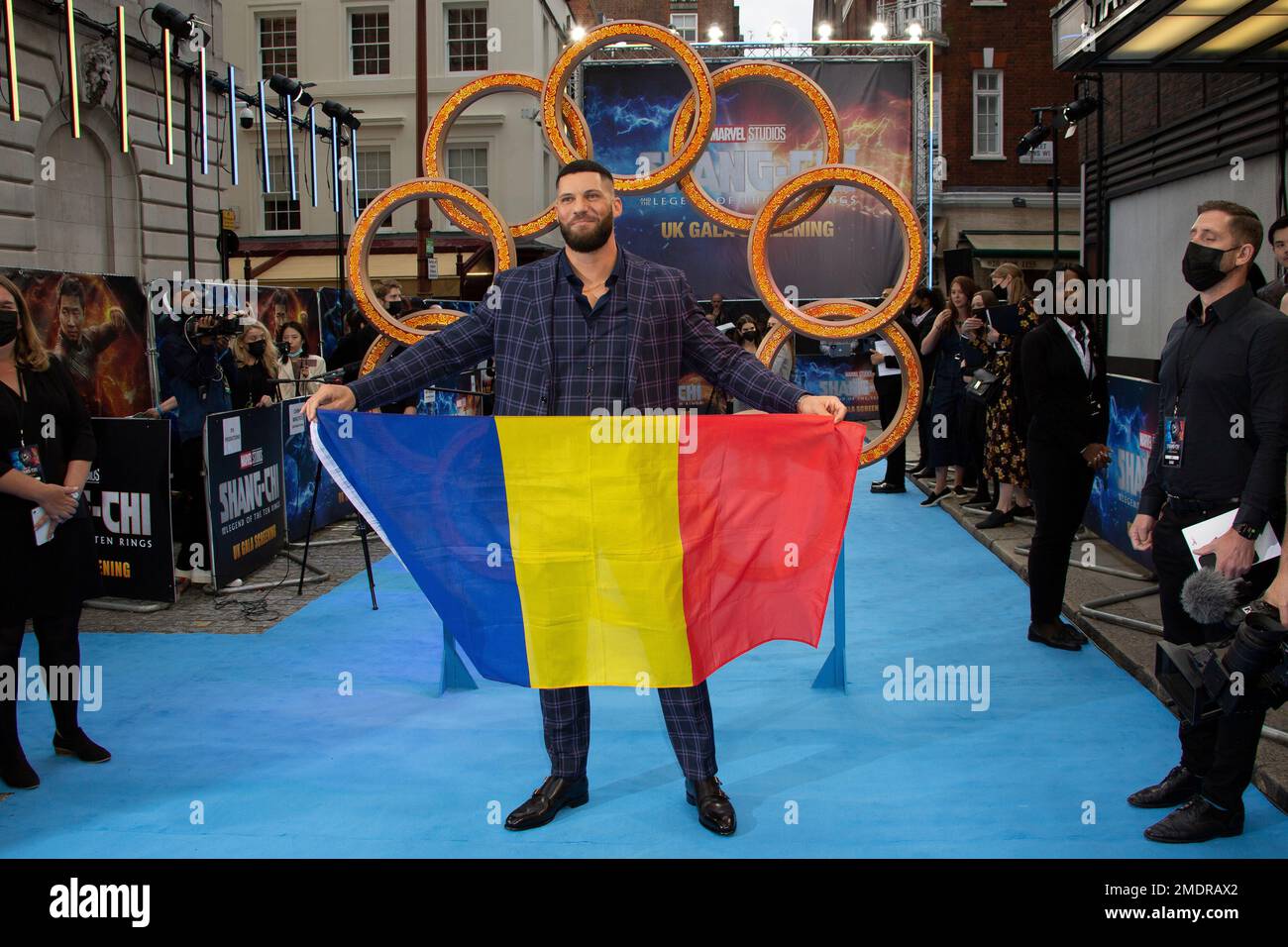 Romanian actor Fiorian Munteanu poses for photographs with his country ...