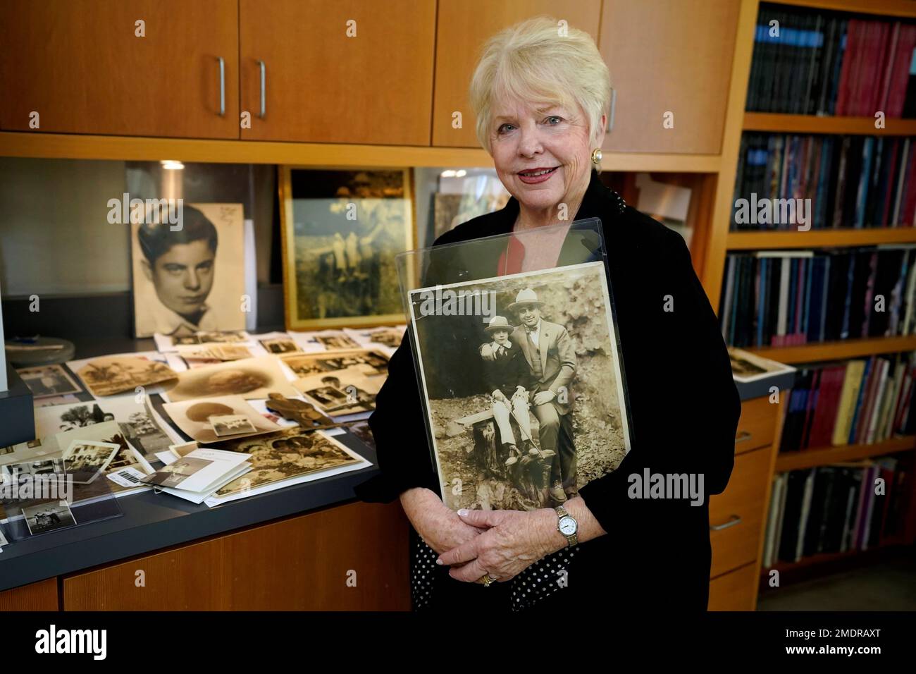 Diane Capone holds a copy of a photograph of her father, Albert "Sonny ...