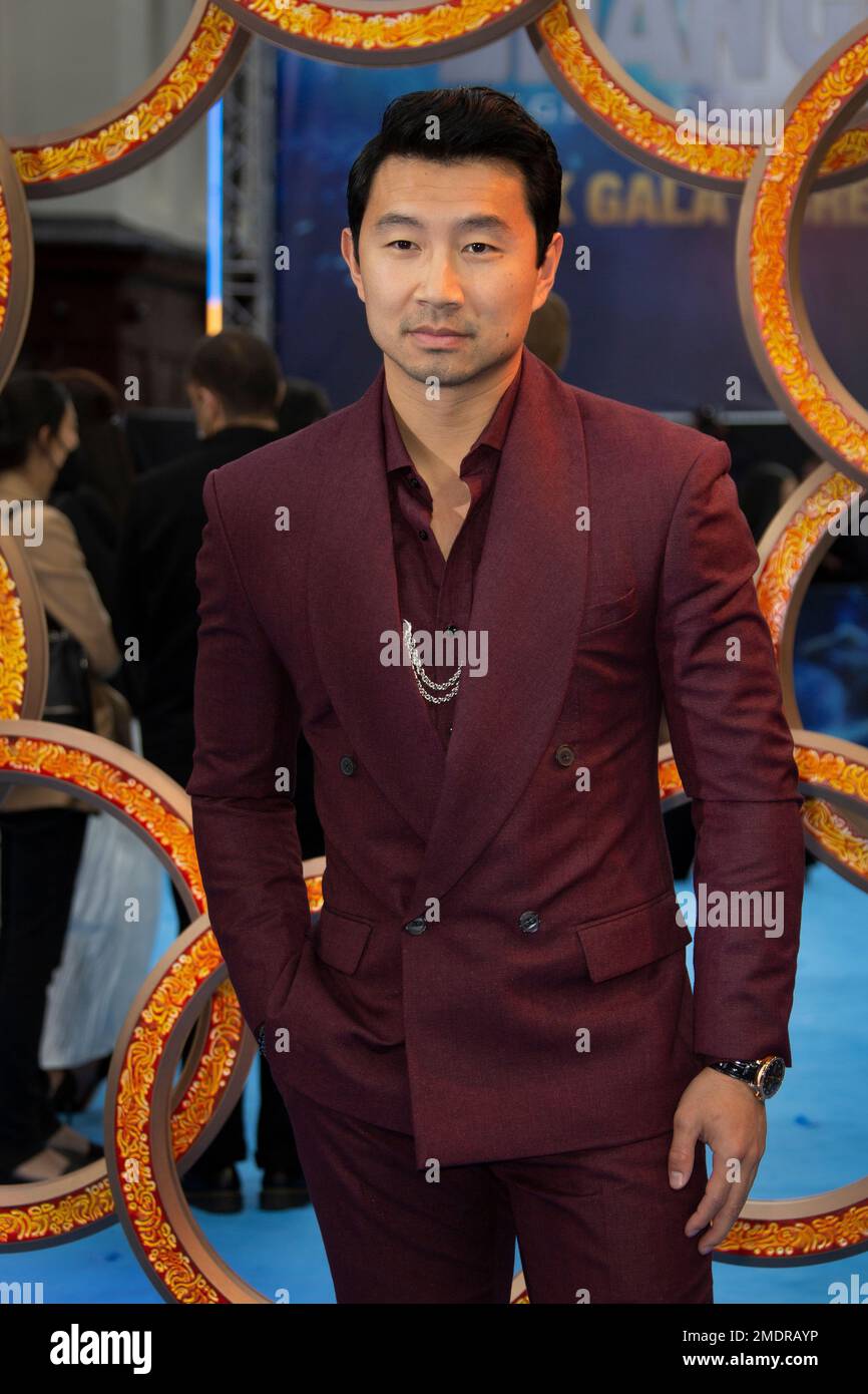 Actor Simu Liu poses for photographs on the red carpet for the premiere ...