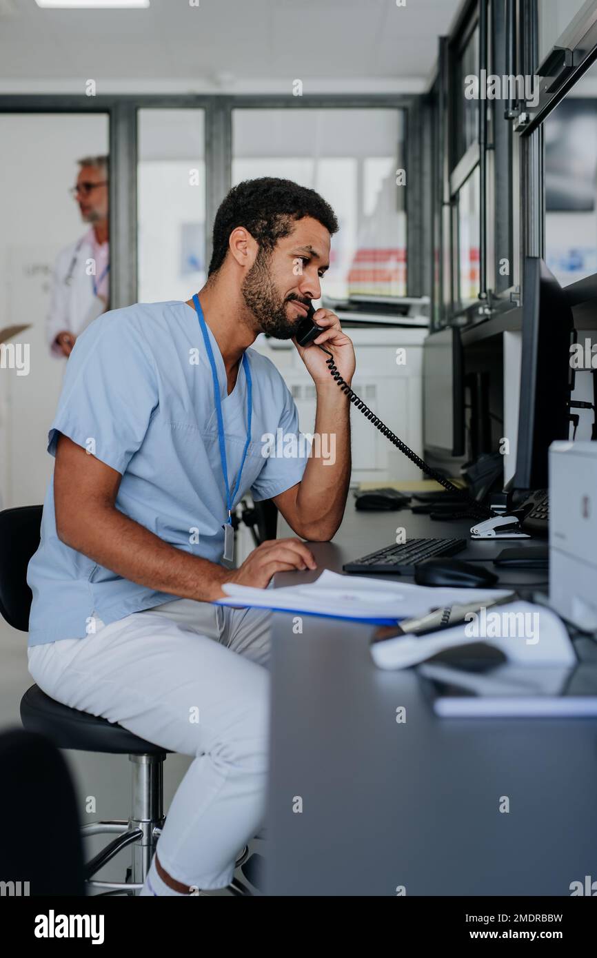 In modern hospital young doctors hi-res stock photography and images ...