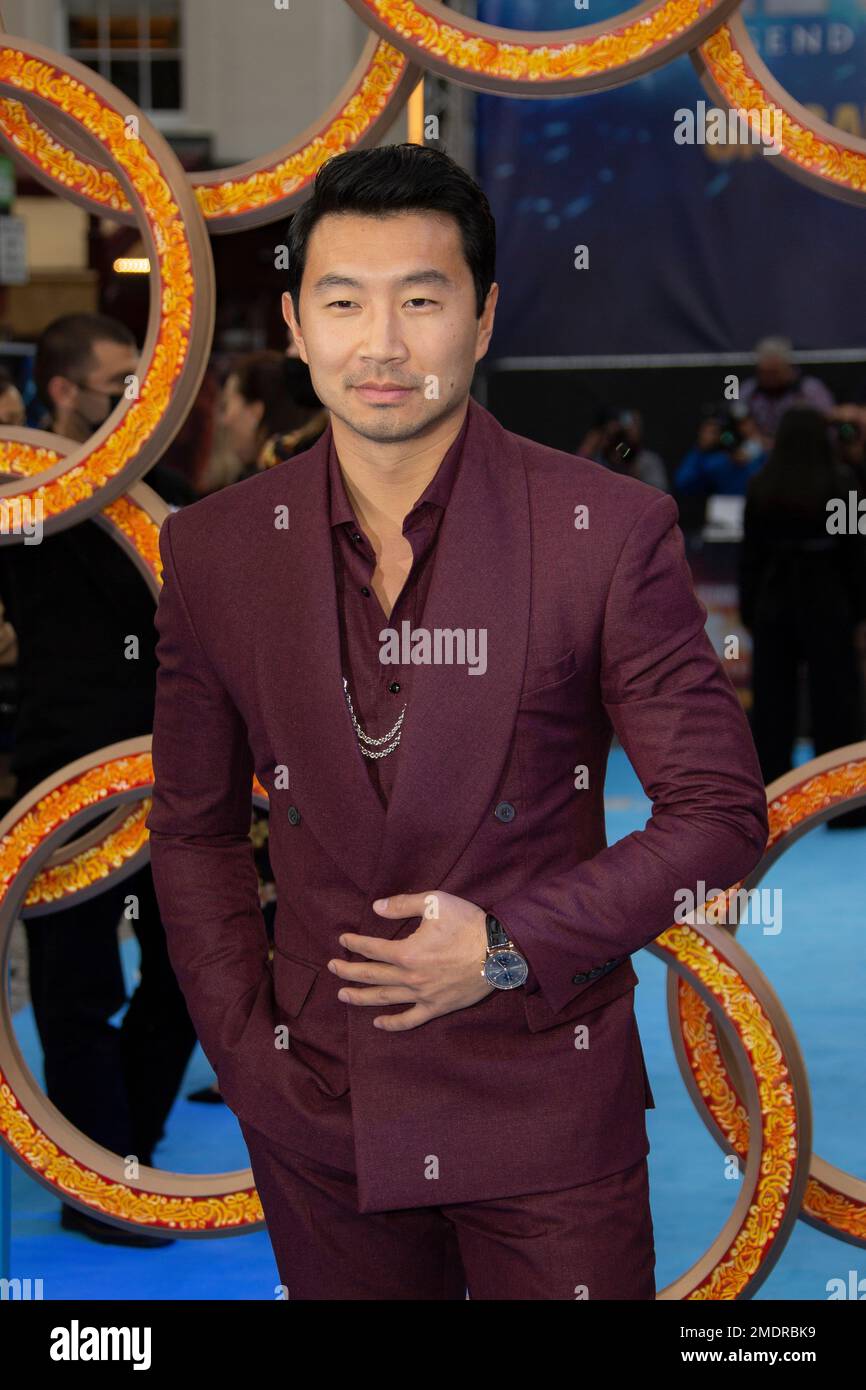 Actor Simu Liu poses for photographs on the red carpet for the premiere ...