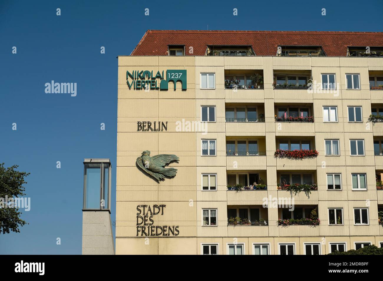 Facade of prefabricated slab building, lettering "Berlin - City of ...