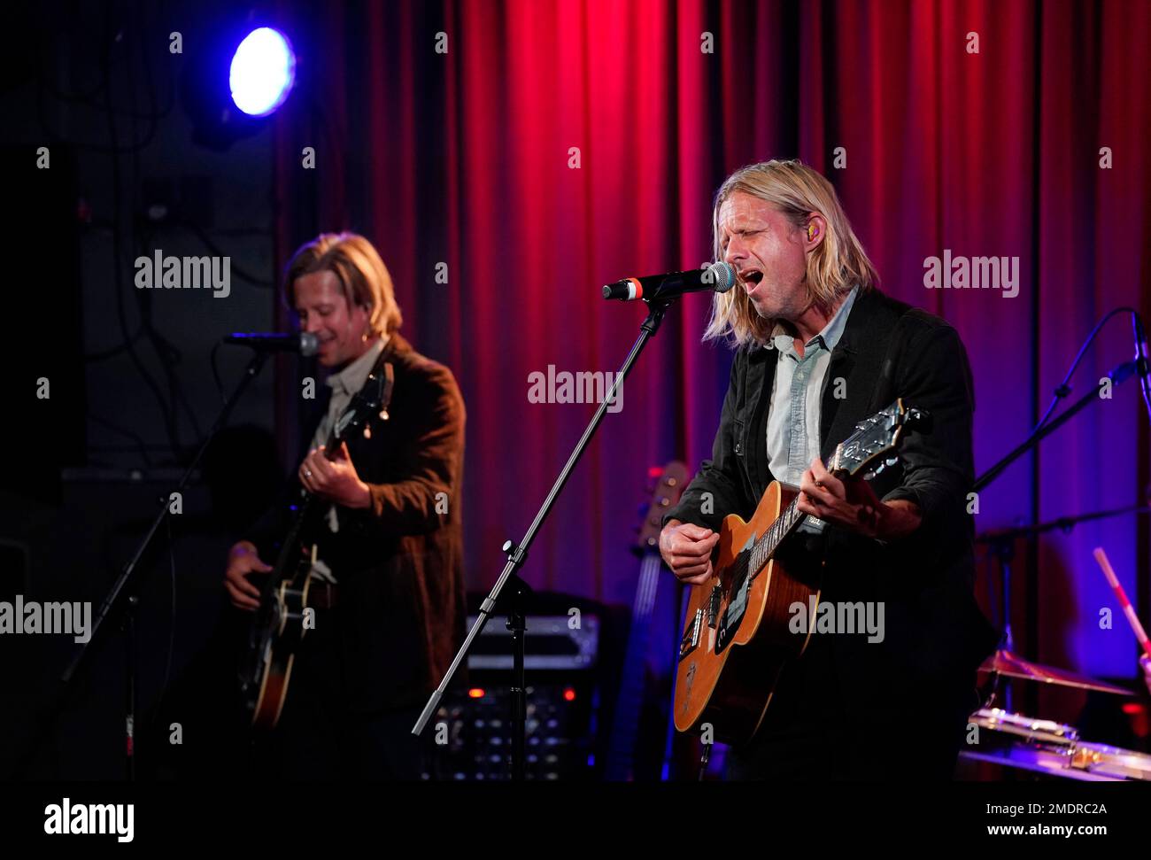 Jon Foreman, right, and his brother Tim of the band Switchfoot perform ...