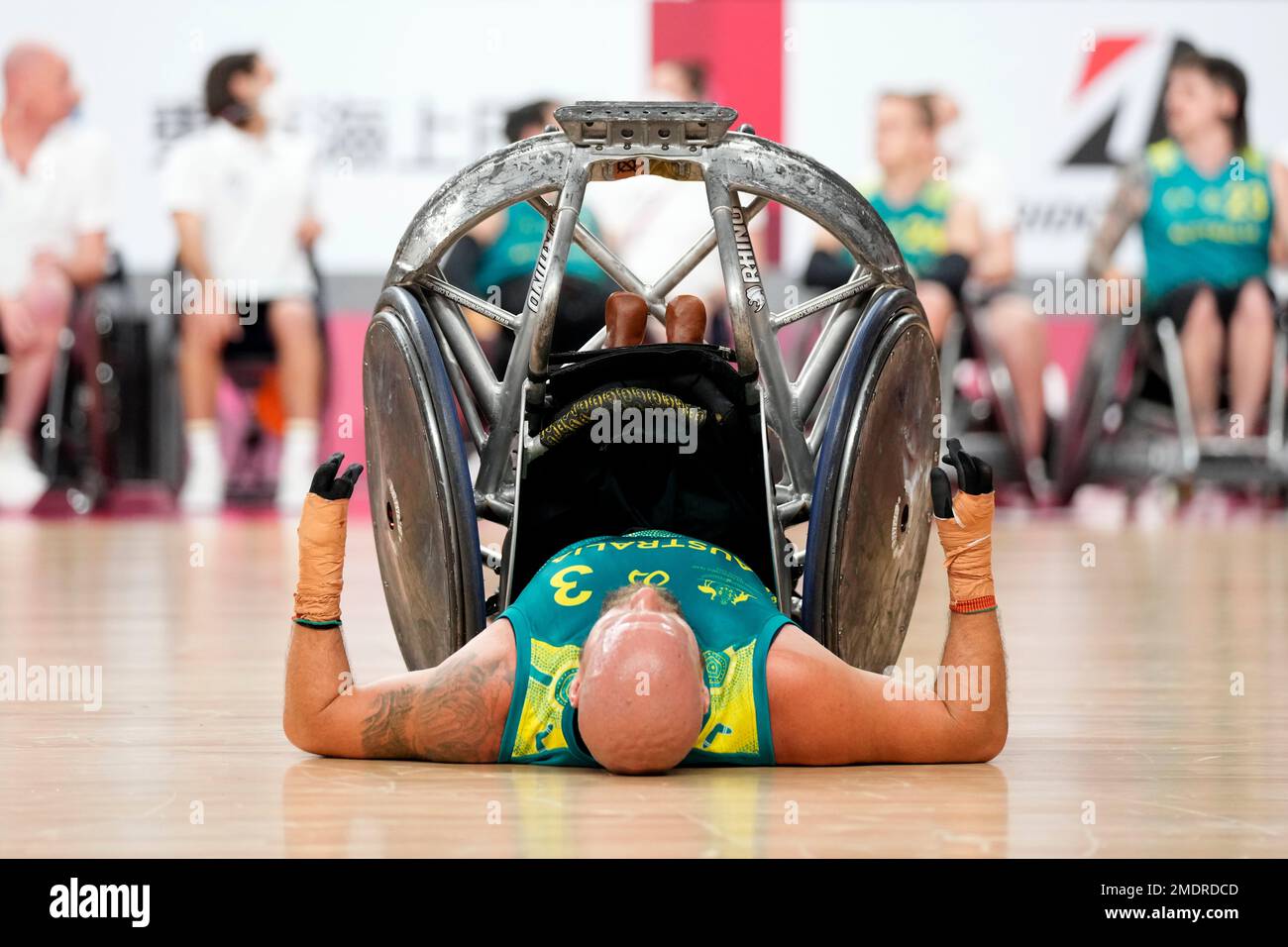 Australia's Ryley Batt on wheelchair lies down after a fall during a ...