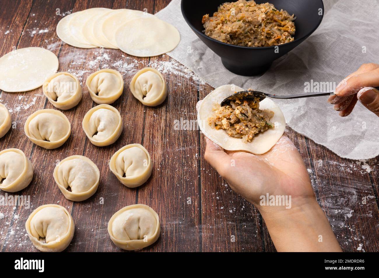 Korean handmade dumplings. Knead the flour by hand to make dumplings ...