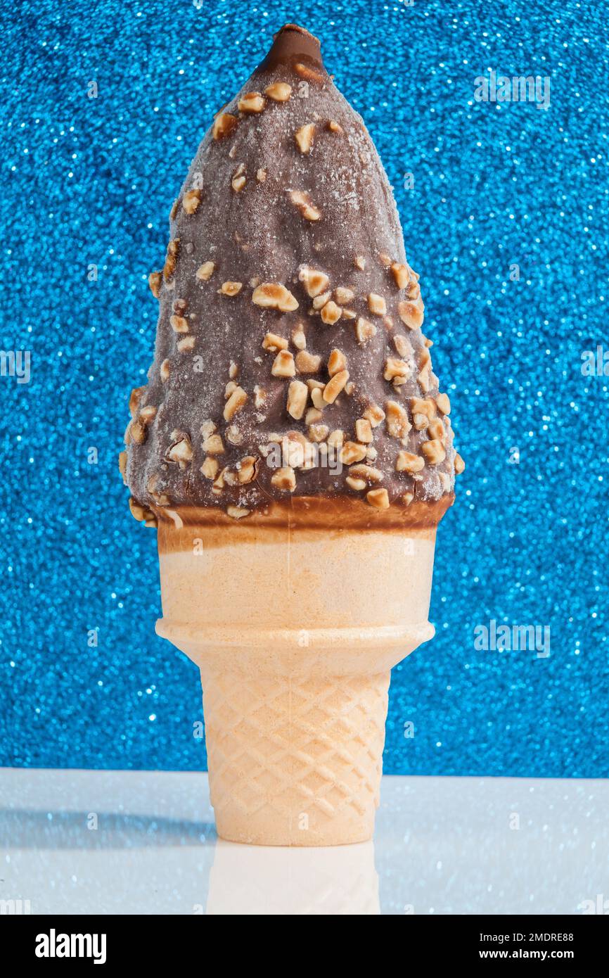 ice cream with chocolate coating and pieces of peanuts Stock Photo - Alamy