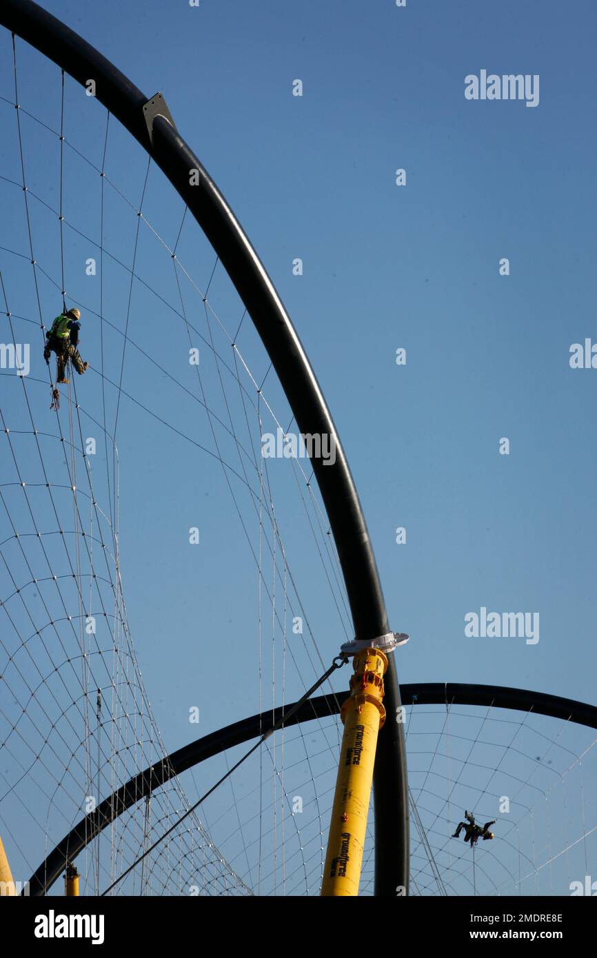 Construction worker building at bridge near the Riverside Stadium ...