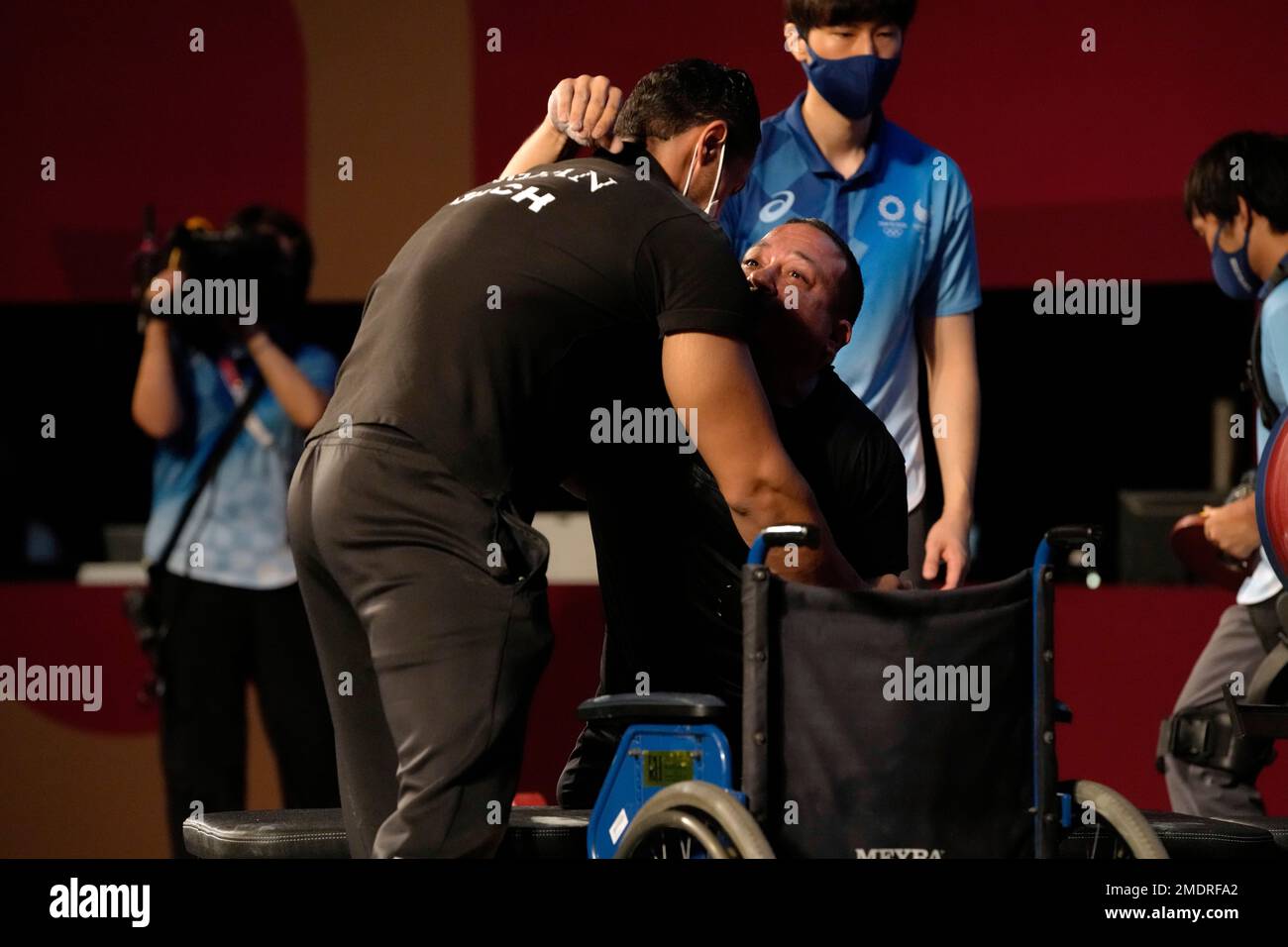 Jordan's Omar Sami Hamadeh Qarada celebrates with his coach after a ...
