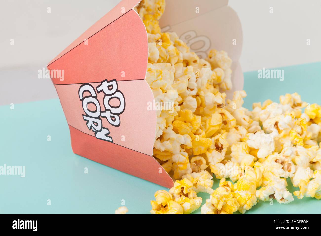 Front view of popcorn inside the package; some scattered in the ...