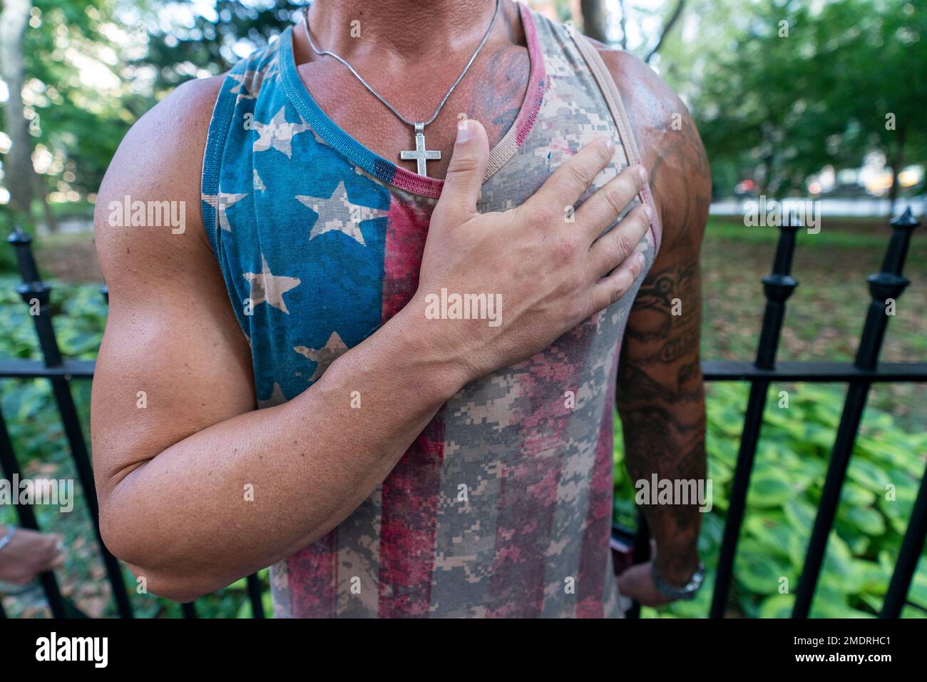 Angelo Boncaraglio, of Staten Island, holds his hand to his heart ...