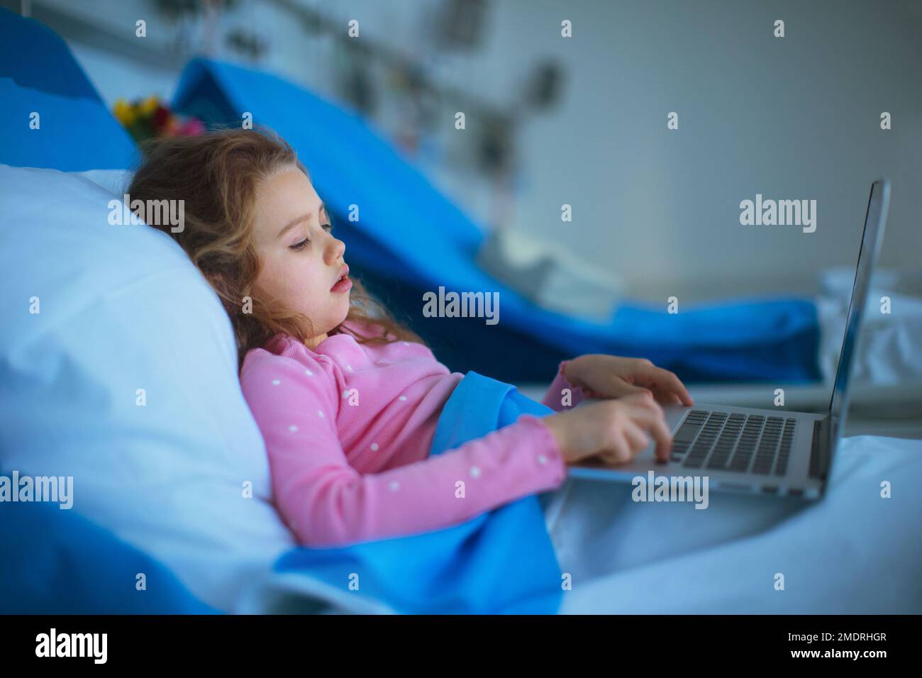 Bored preschool child with laptop hi-res stock photography and images ...