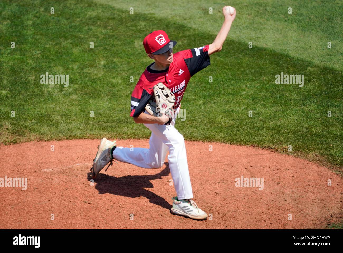 Hamilton, Ohio's Kaleb Harden (10) delivers a pitch against Hooksett, N ...
