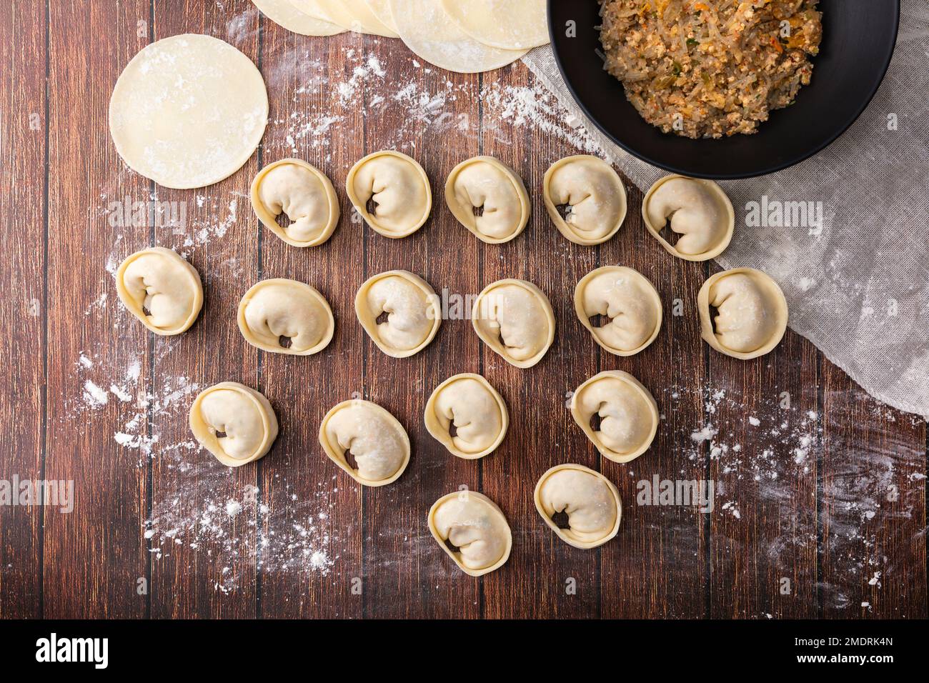 Homemade kimchi dumplings made with wheat flour and shaped into round ...