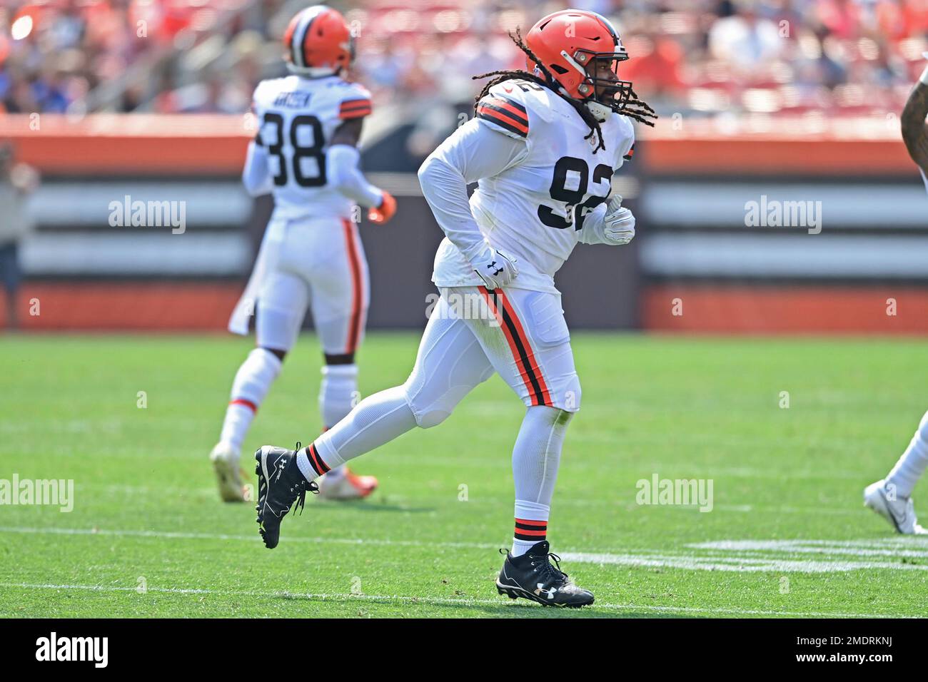 Cleveland Browns defensive tackle Sheldon Day runs to the sideline ...