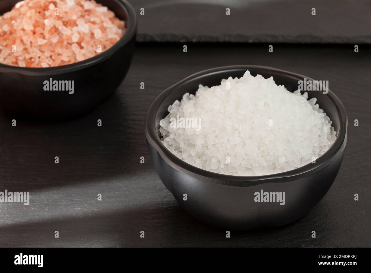 Salt - Crystals of sea salt and pink salt of natural origin Stock Photo ...