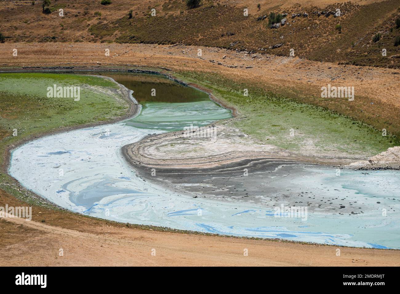 Heavily polluted Litani River flows through the village of Saghbin ...