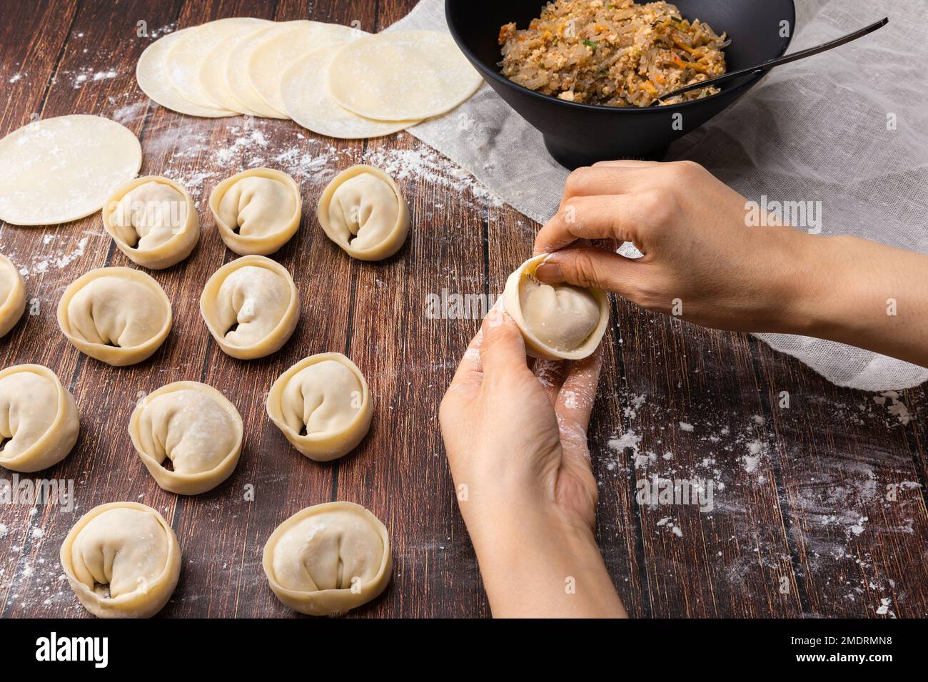 Korean handmade dumplings. Knead the flour by hand to make dumplings ...