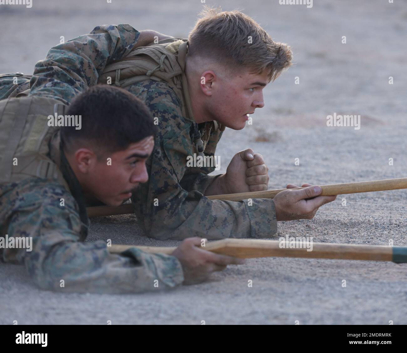 U.S. Marine Corps Lance Cpl. Raymond Lotman, far, small arms technician ...