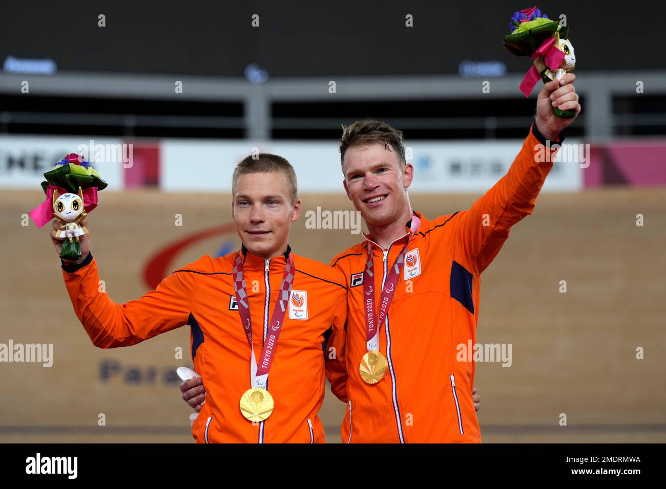 Netherlands' Tristan Bangma, left, and his pilot Patrick Bos pose with ...