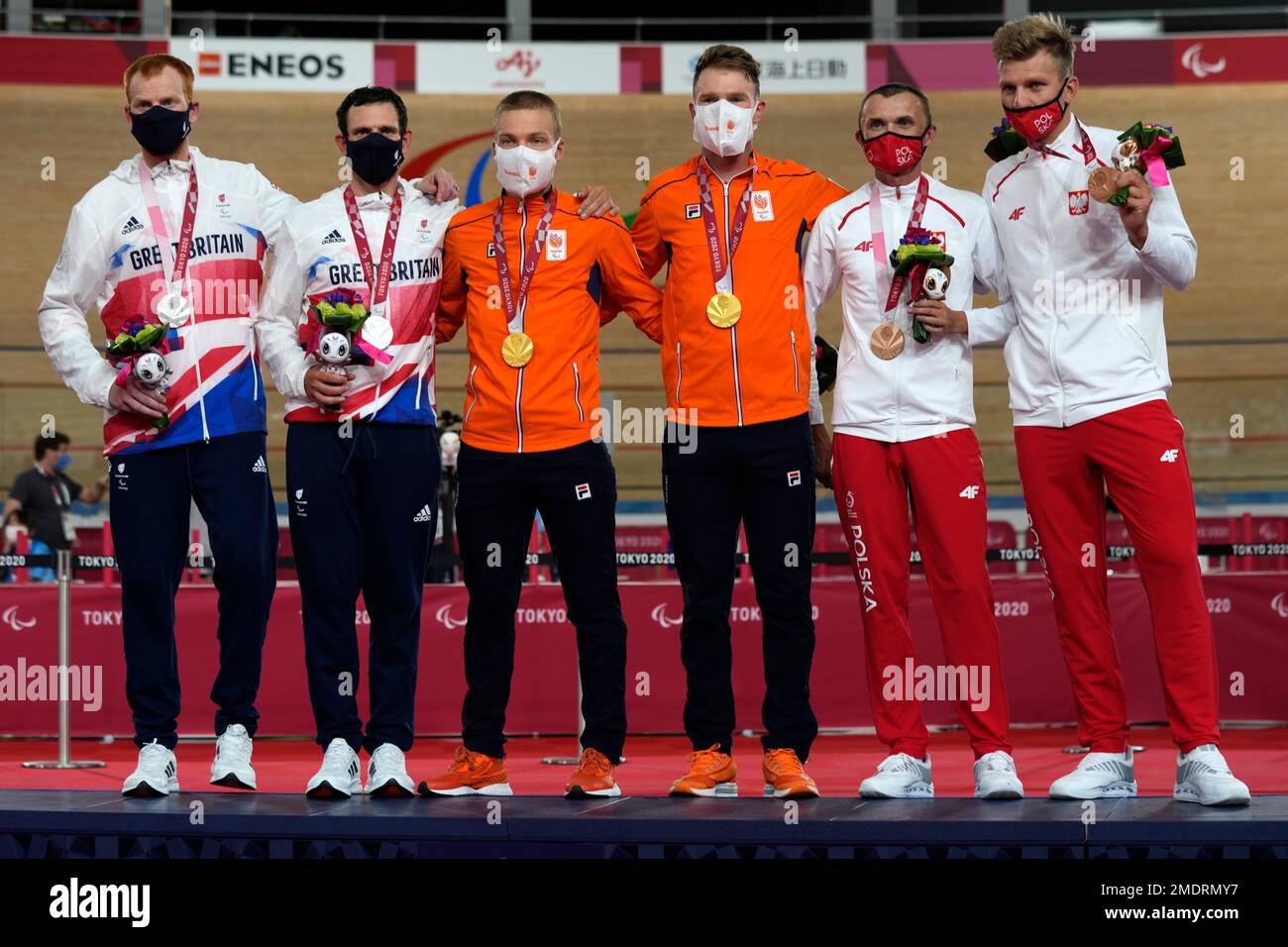 Netherlands' Tristan Bangma, center left, and his pilot Patrick Bos ...