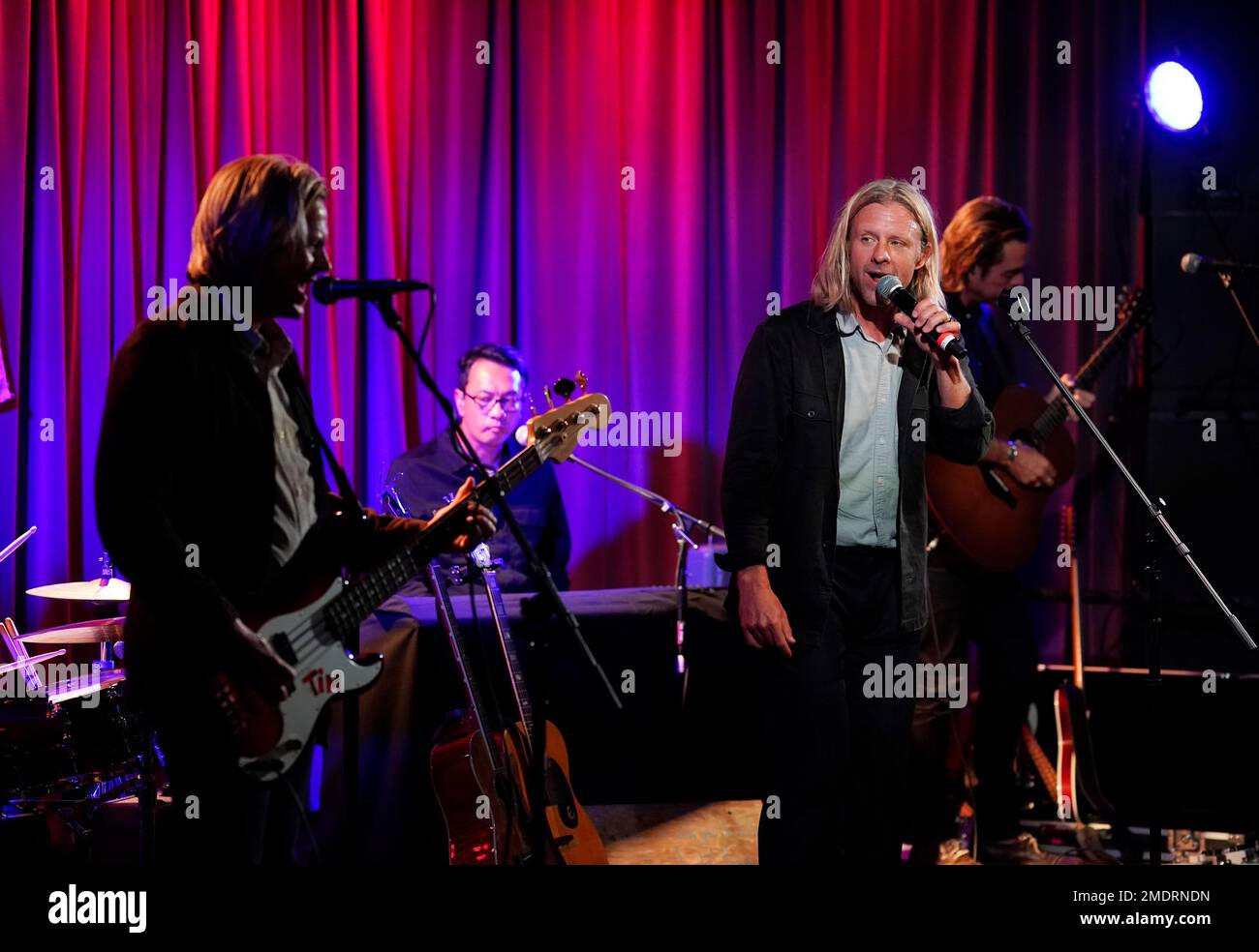 Tim Foreman, left, and his brother Jon of the band Switchfoot perform ...