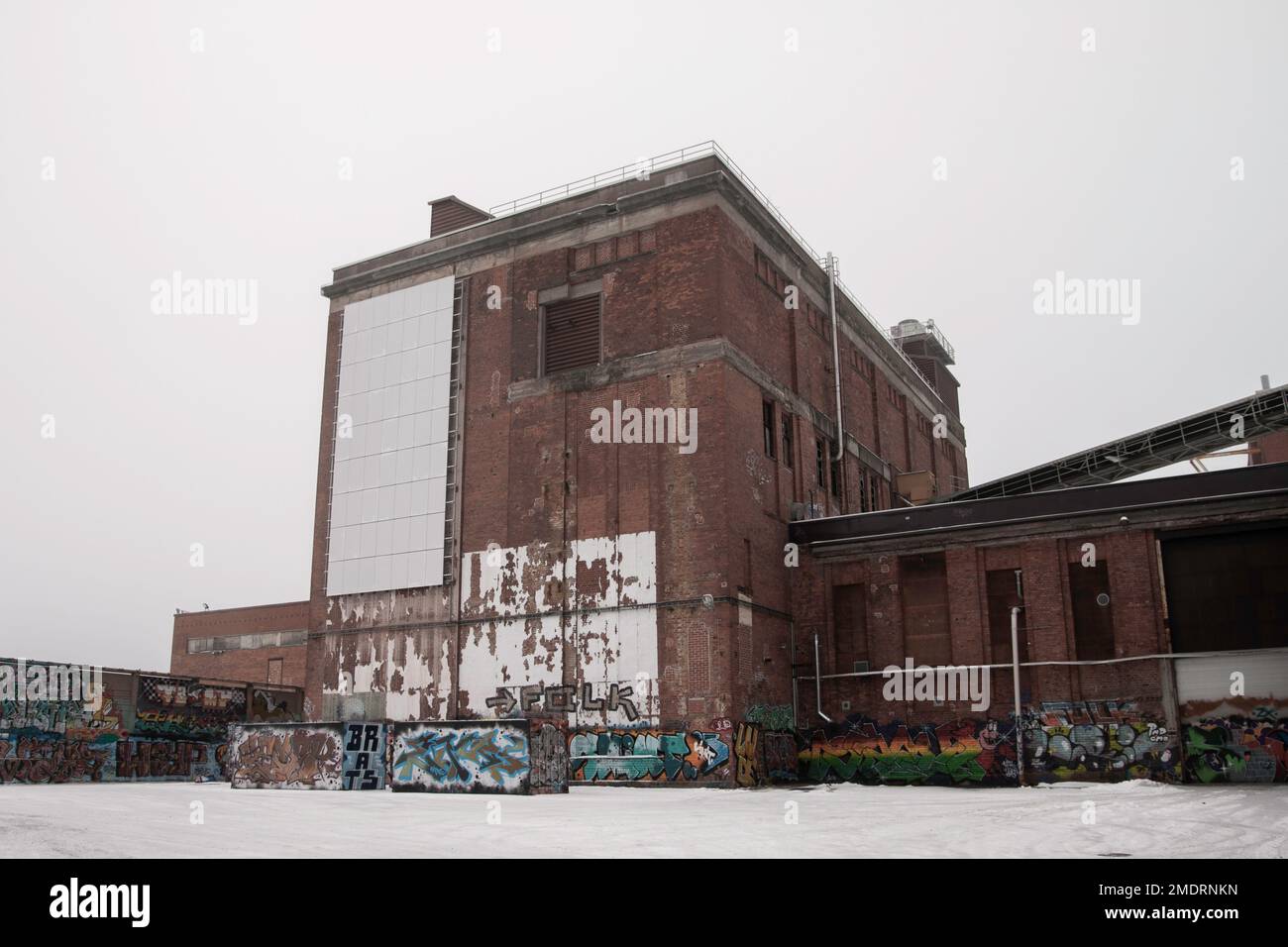 Photoshoot at an old factory, Graffiti art walls, old industrial ...