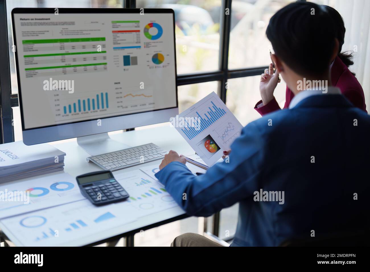 Beautiful business woman consultant talking with asian business person ...