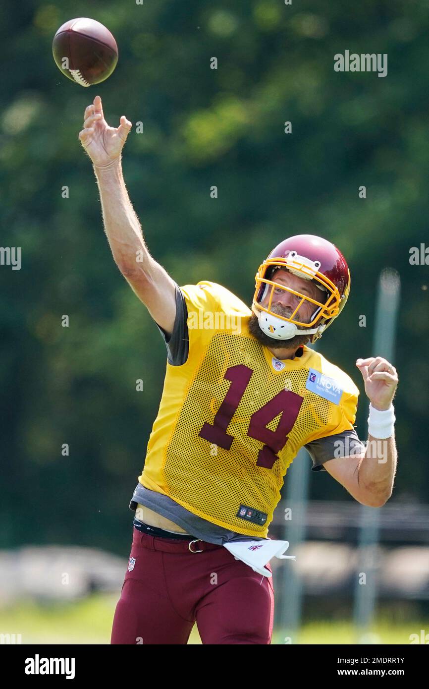 Washington Football Team quarterback Ryan Fitzpatrick (14) throws the ...
