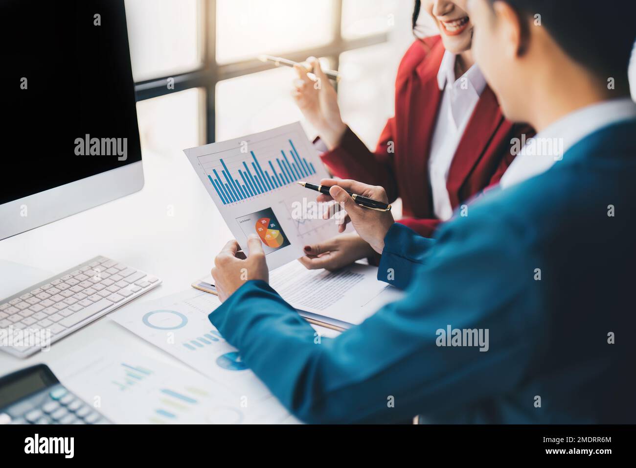 Beautiful business woman consultant talking with asian business person ...