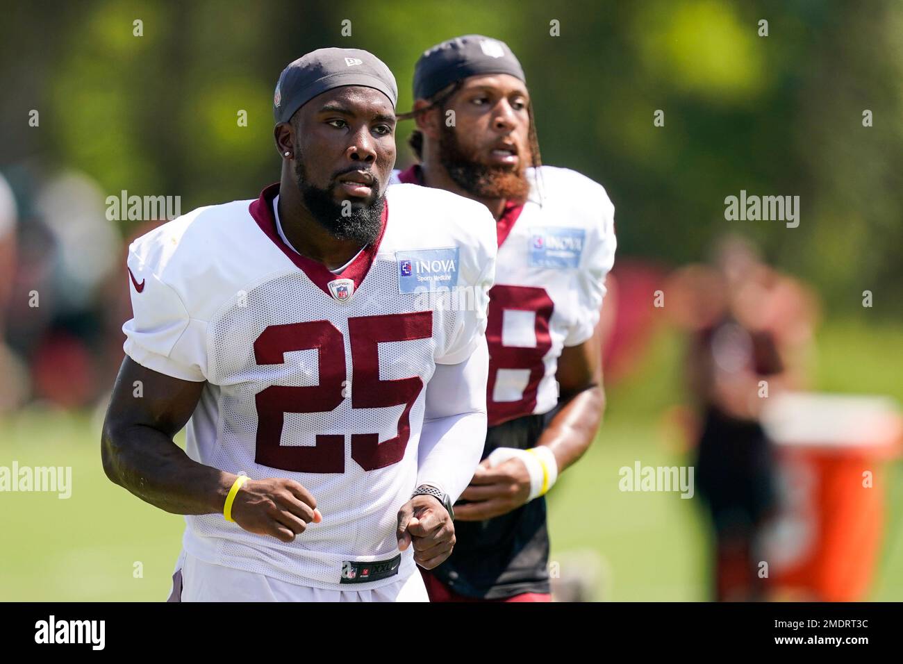 Washington Football Team running backs Peyton Barber (25) and Jonathan ...