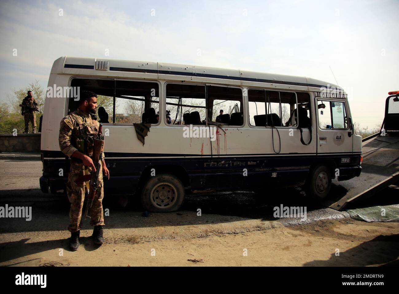 Security personnel arrive at the site of a bomb explosion in Kabul ...