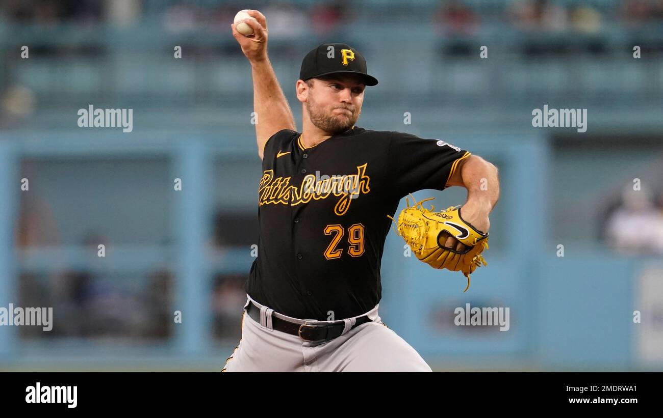 Pittsburgh Pirates starting pitcher Wil Crowe throws to the Los Angeles ...
