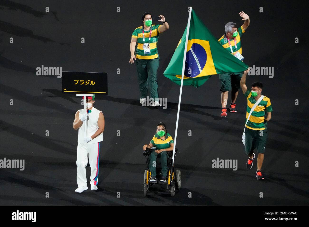 Athletes from Brazil enter the stadium during the opening ceremony for ...