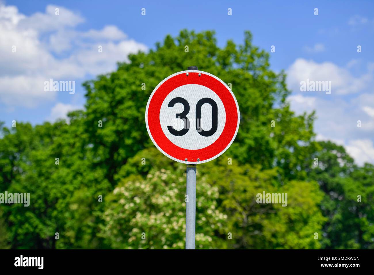 Traffic sign speed 30 Stock Photo - Alamy