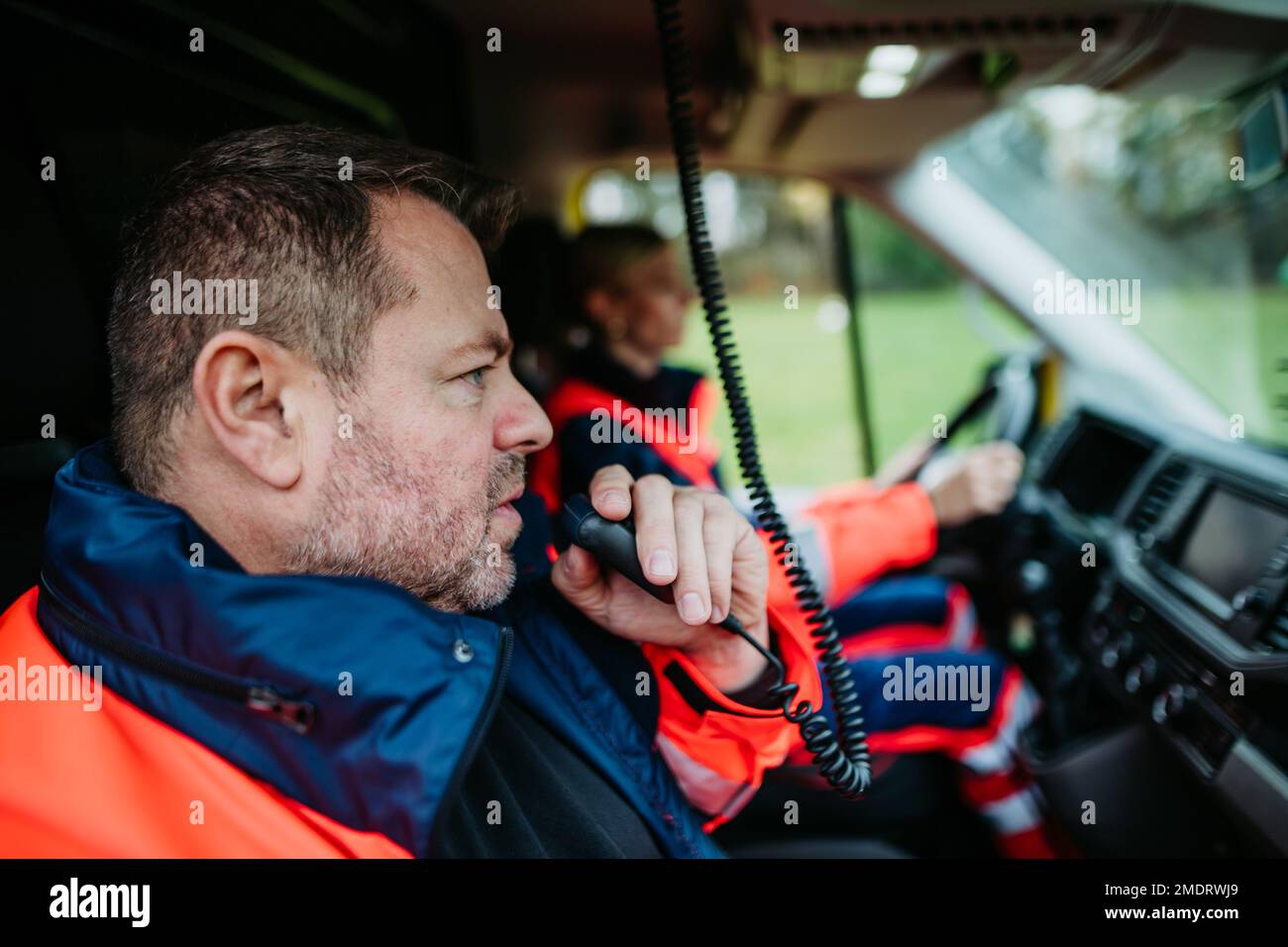 Team of rescuers preparing in ambulance car to outdoor operation Stock ...