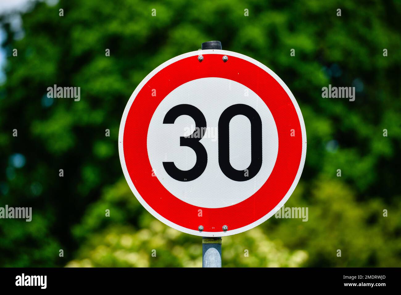 Traffic sign speed 30 Stock Photo - Alamy