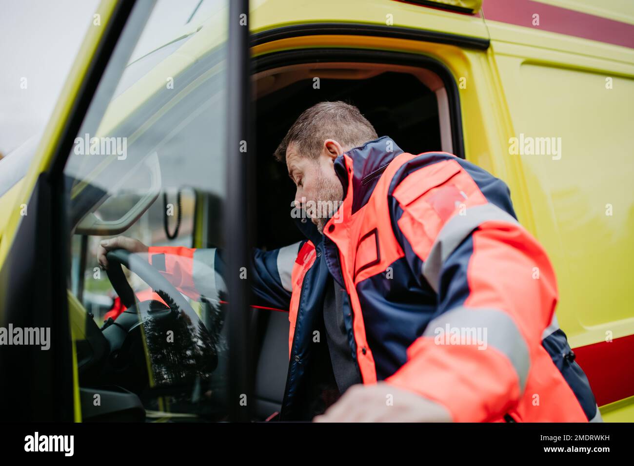 Paramedic rescuer getting ambulance hi-res stock photography and images ...